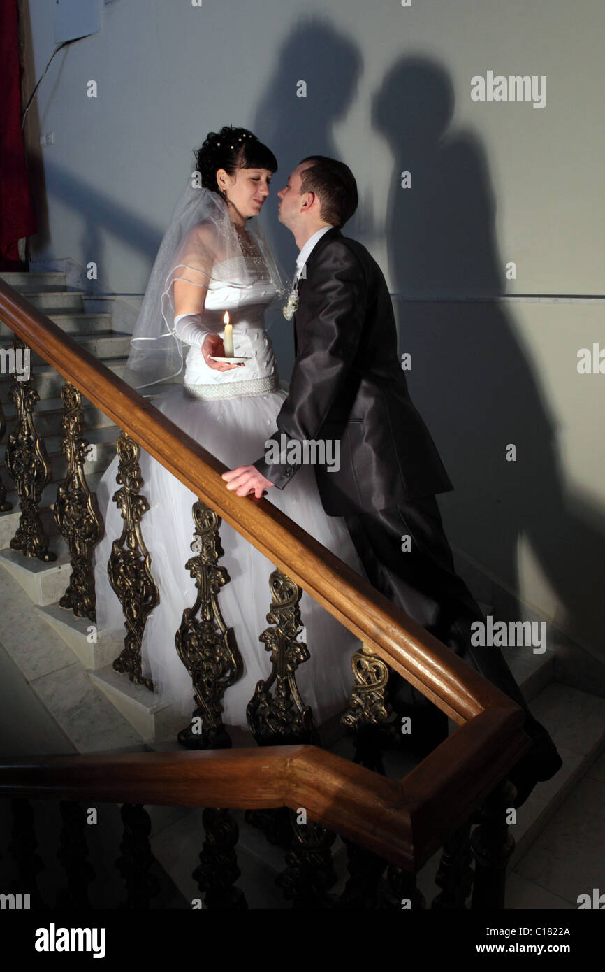 Wedding kiss in an ancient private residence Stock Photo - Alamy