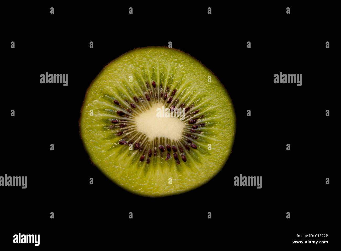 kiwi isolated on black backround Stock Photo - Alamy