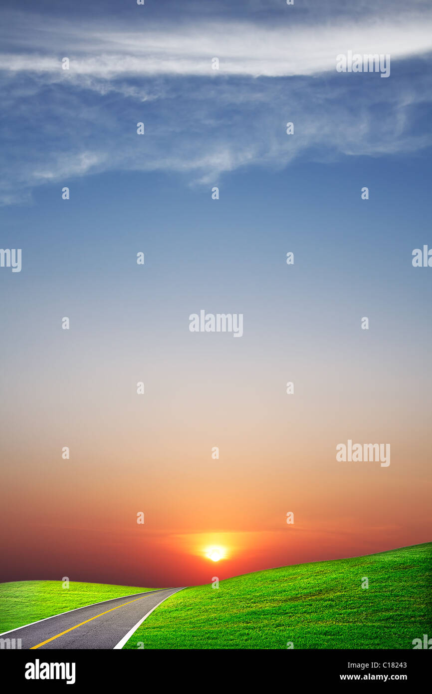 Summer landscape with country road at sunset Stock Photo - Alamy