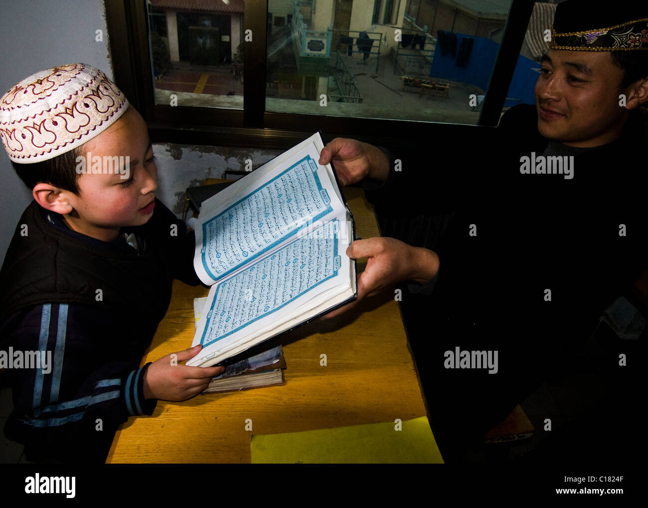 Muslim boys studying the Qur'an in a Madrasa ( Islamic school Stock ...