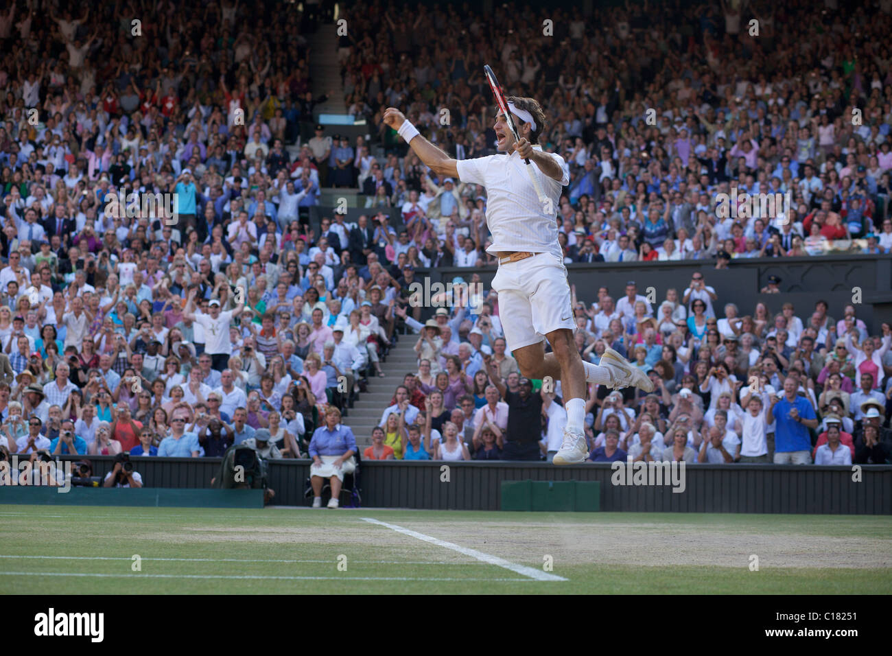 Roger Federer, Switzerland, celebrates his five set victory over Andy ...