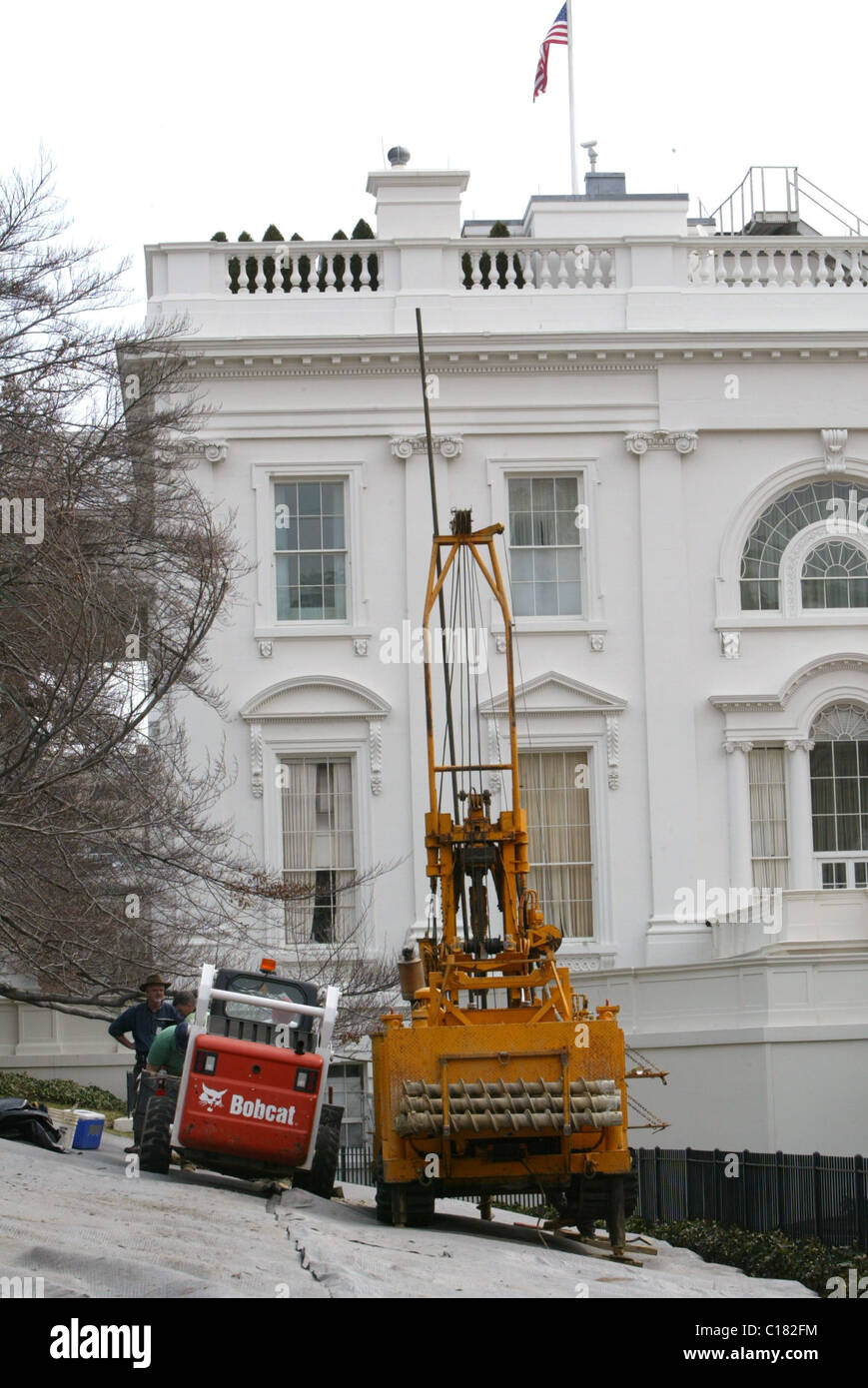 A geological investigation testing soil takes place on the White House ...