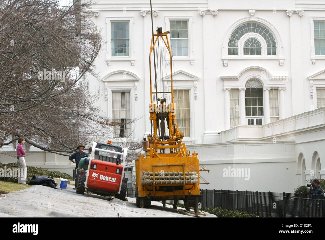 A geological investigation testing soil takes place on the White House ...