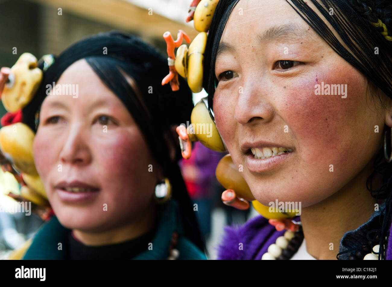A colorful Tibetan woman in the regions of eastern Tibet ( Sichuan ...