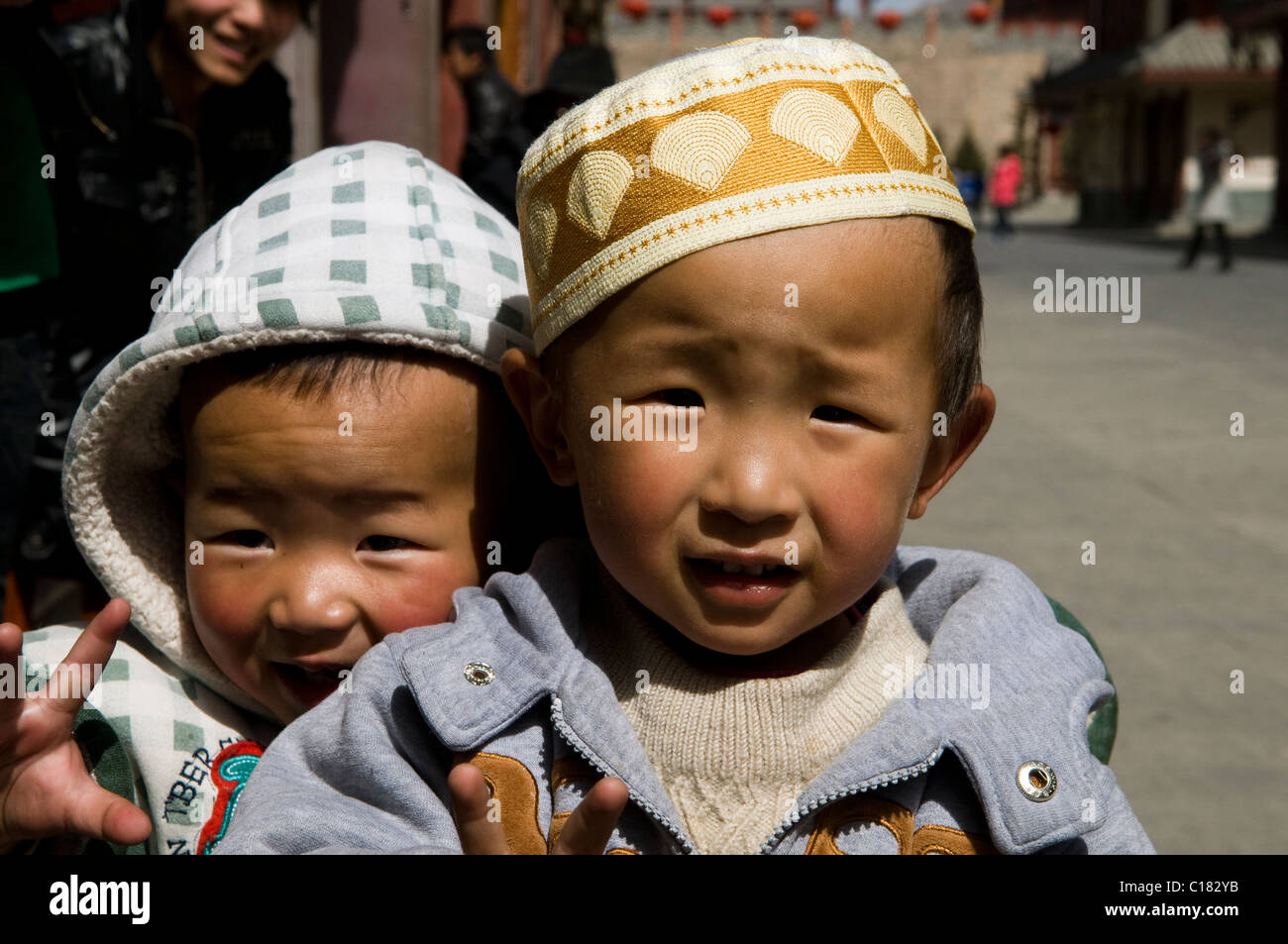 Cute Hui Muslim brothers Stock Photo - Alamy