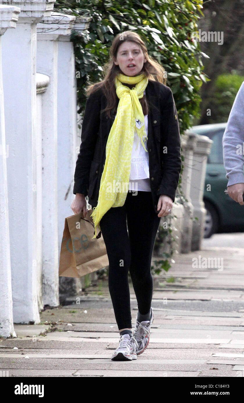 Pregnant Jools Oliver leaves her house to run errands, sporting an ever ...