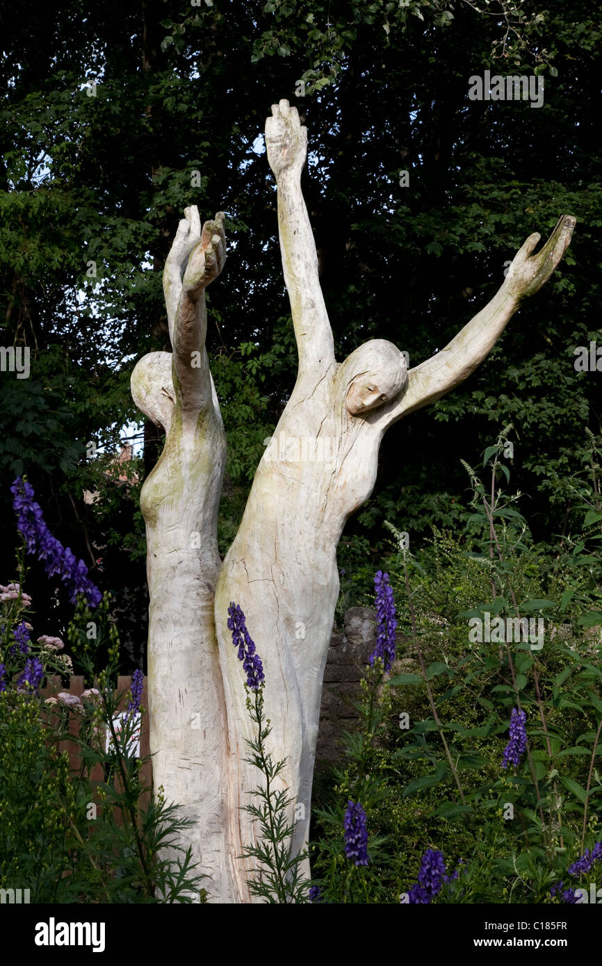 Wooden sculpture made from tree trunks Stock Photo - Alamy