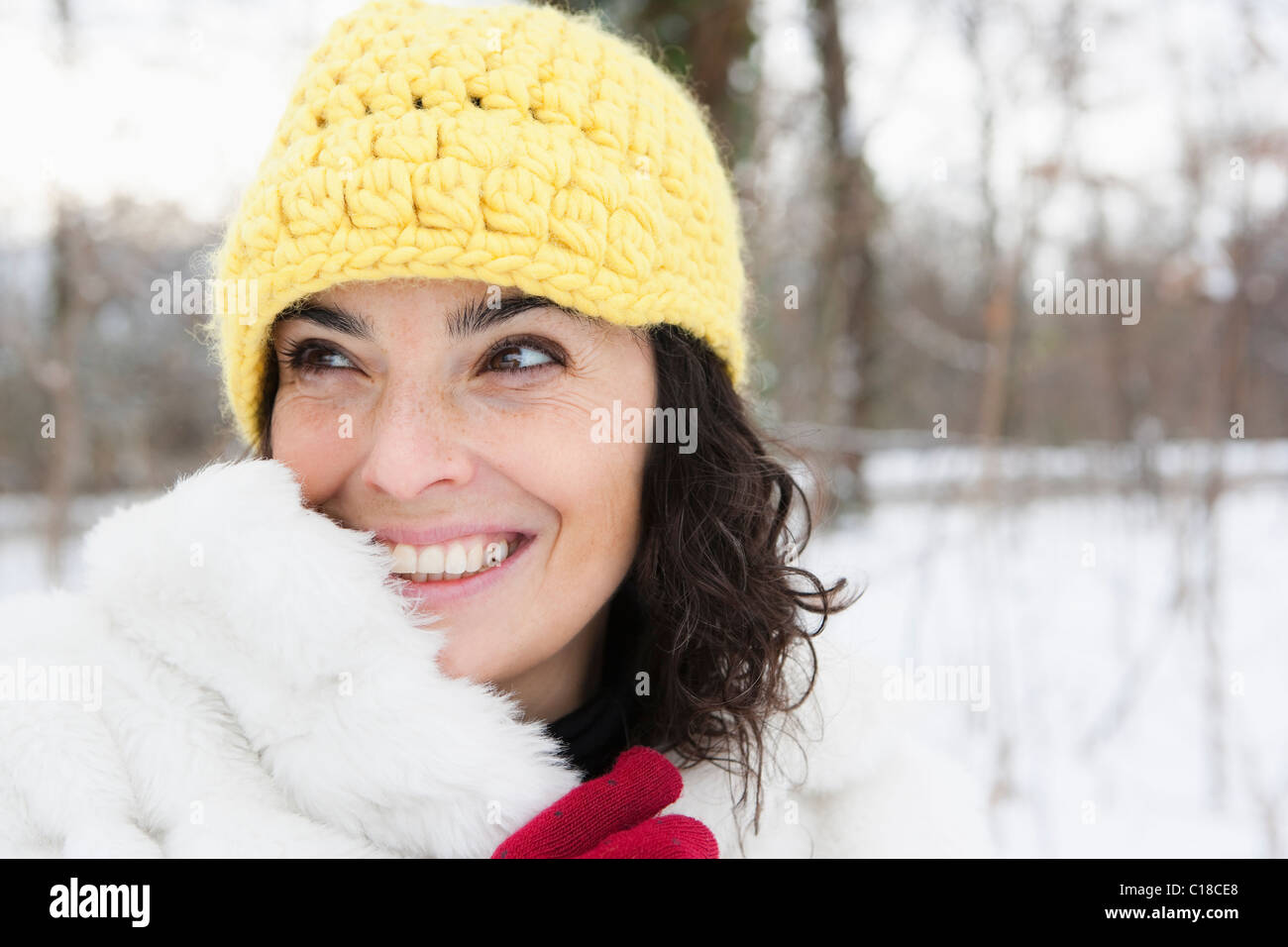 Smiling woman wearing cap in hi-res stock photography and images - Alamy