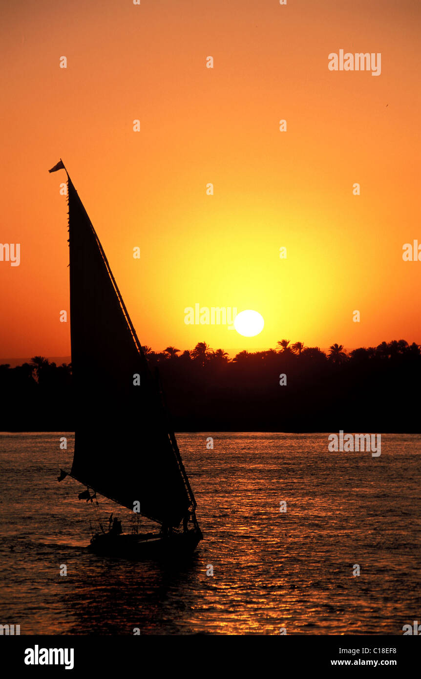 Egypt, Nile valley, Aswan, felucca at sunset Stock Photo - Alamy