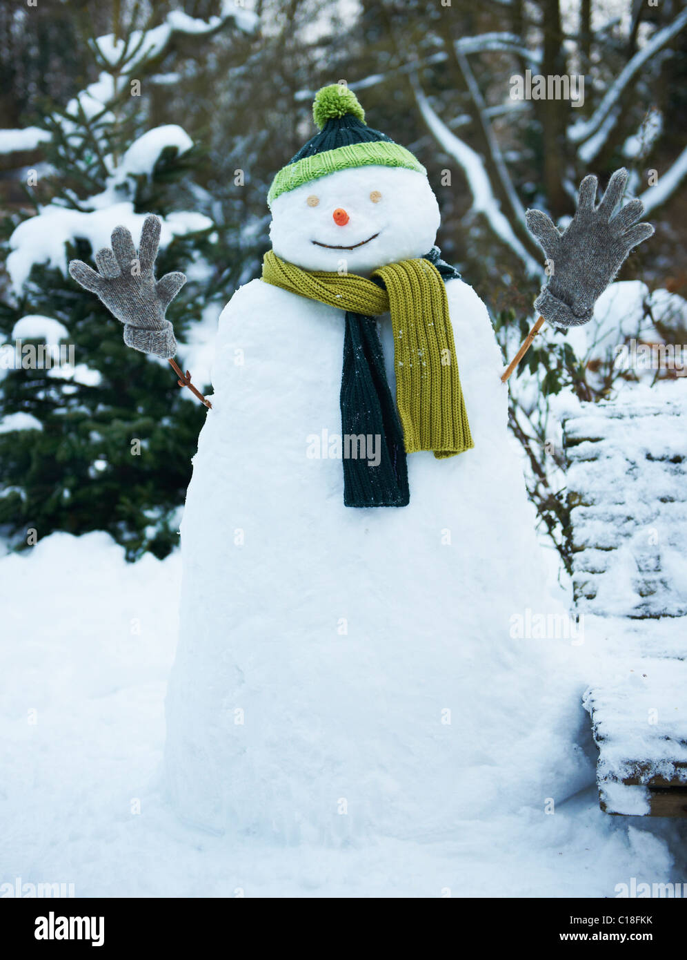 Snowman with hat and gloves Stock Photo - Alamy