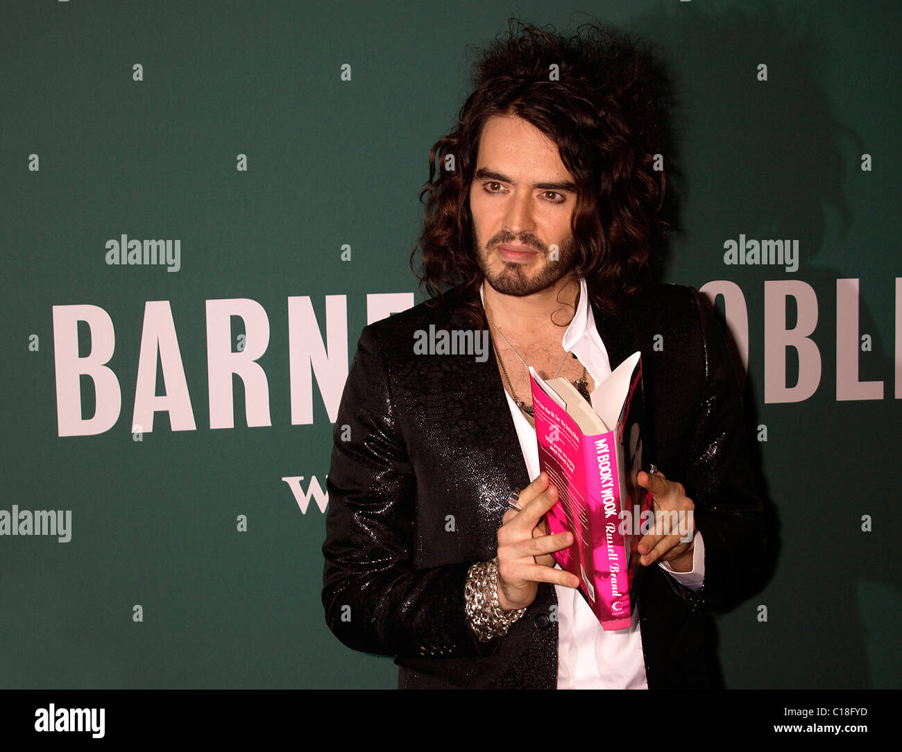 Russell Brand signs copies of his book 'Russell Brand: My Booky Wook ...