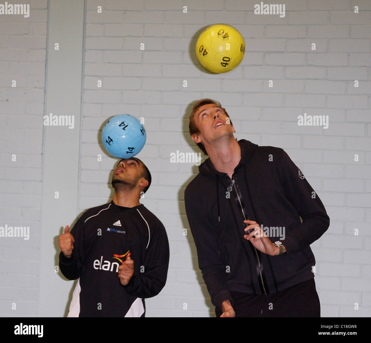 Bilal Awan, Peter Crouch Peter Crouch attends a photocall for Elite Youth at the Osmani Youth ...