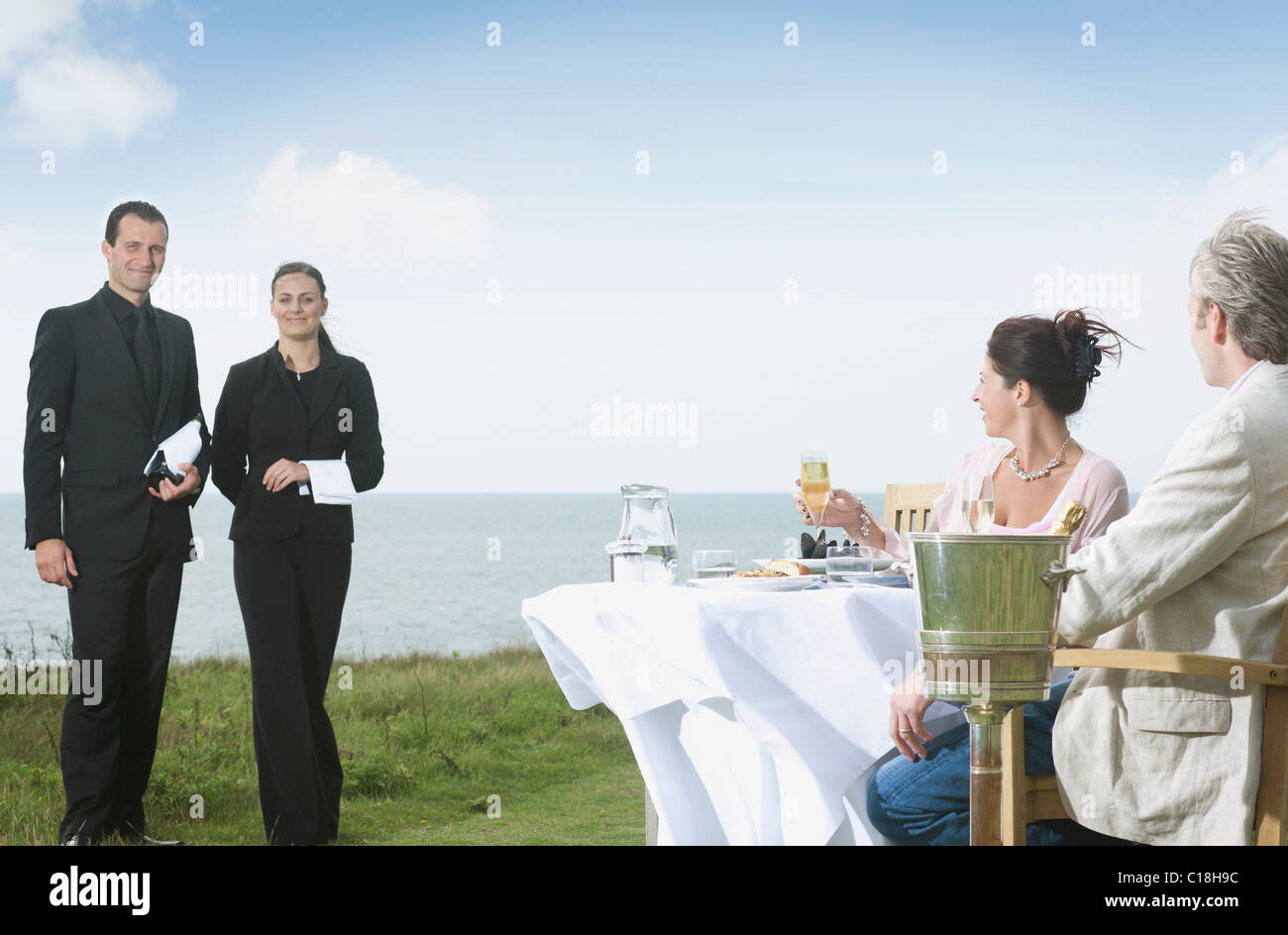 Waiter serving food full view hi-res stock photography and images - Alamy