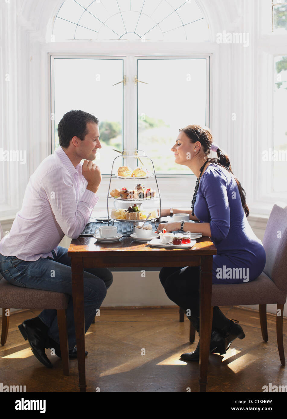 Couple having tea Stock Photo - Alamy