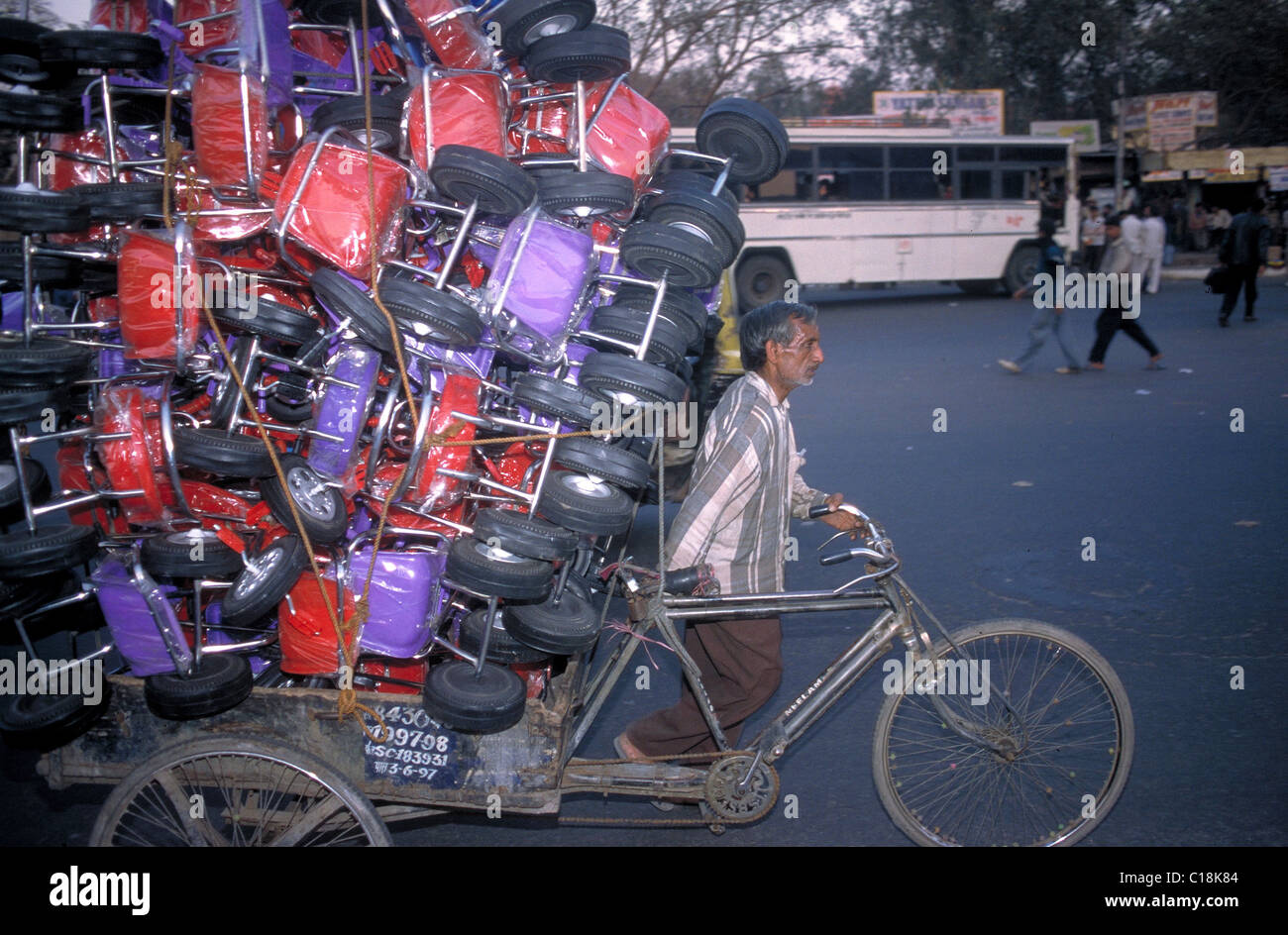 A bike overloaded with goods Delhi, India Stock Photo - Alamy