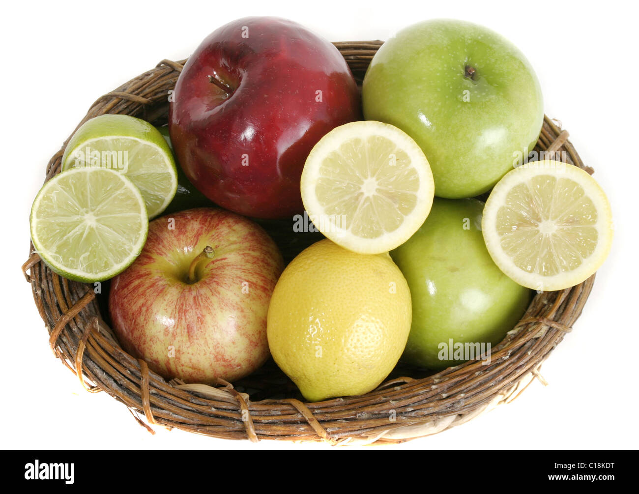 Large selection of colorful fruit including apples, lemons, and limes ...