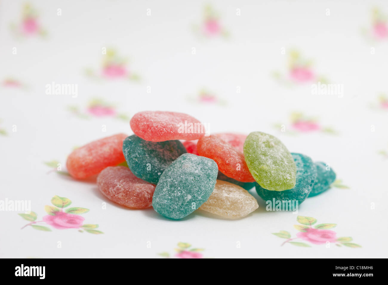 super sours sweets and candy on a paper background photographed in a ...
