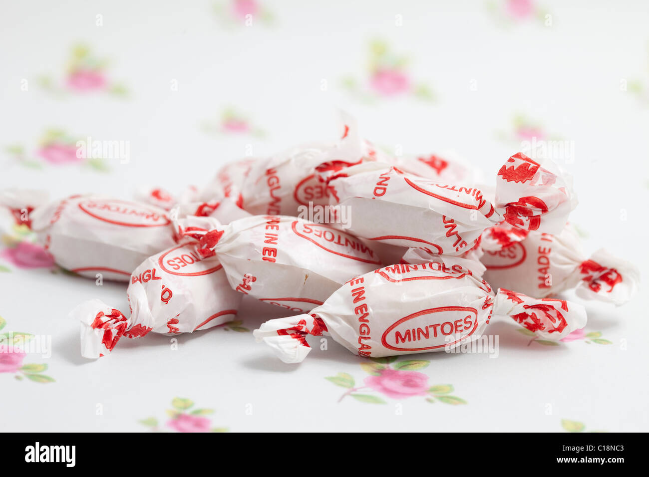 mintoes sweets and candy on a paper background photographed in a studio ...