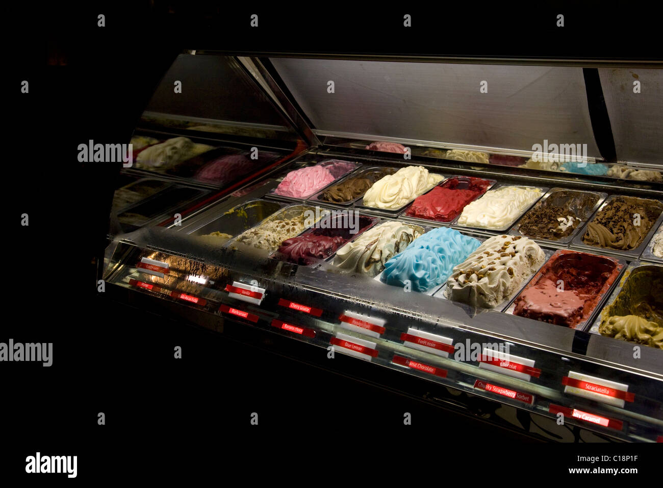 Ice cream display at night Stock Photo - Alamy