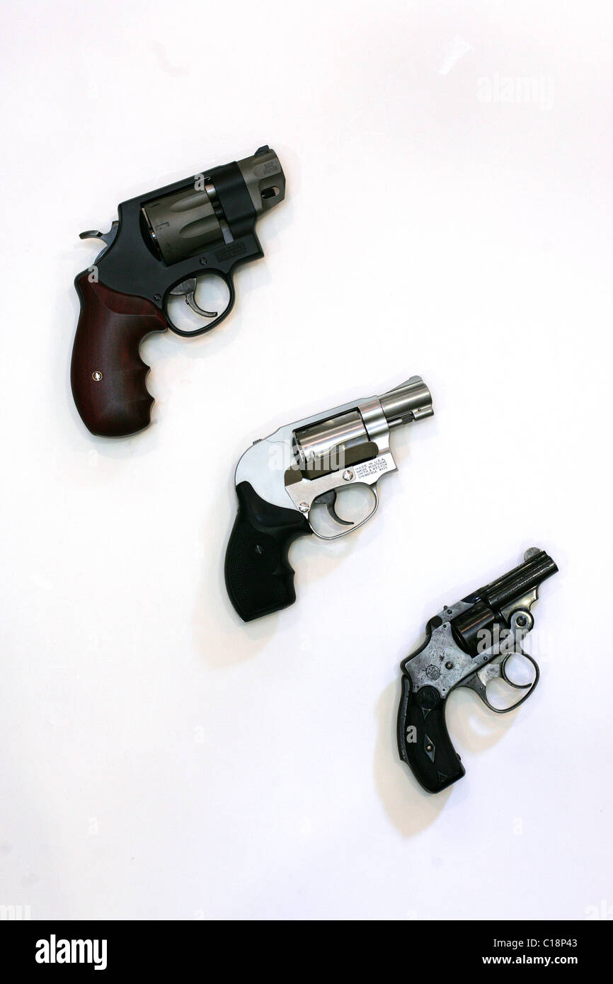 Handguns in a white background Stock Photo - Alamy