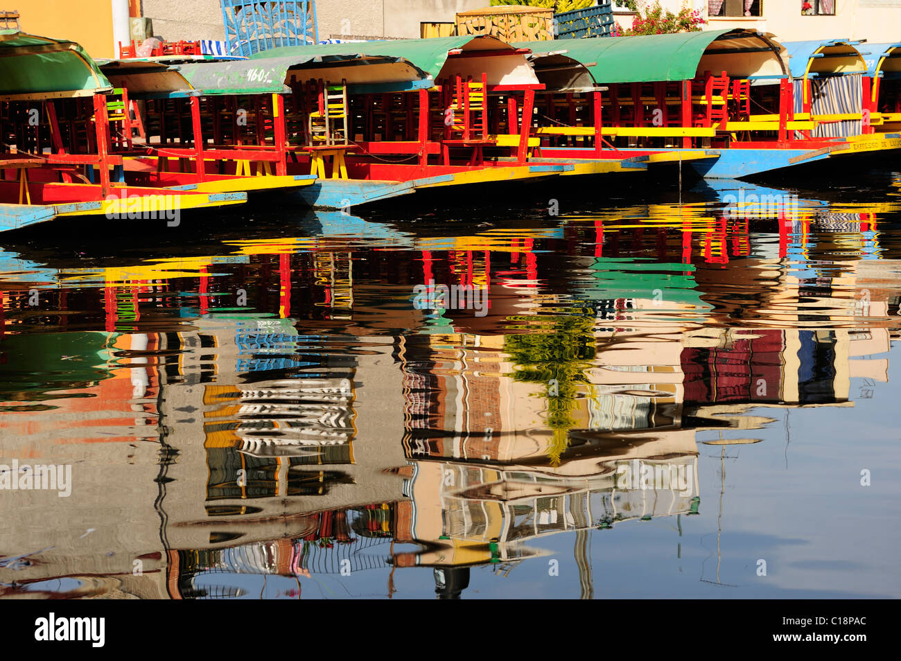 Colourful boats on canal in Xochimilco, Mexico City, Mexico Stock Photo ...
