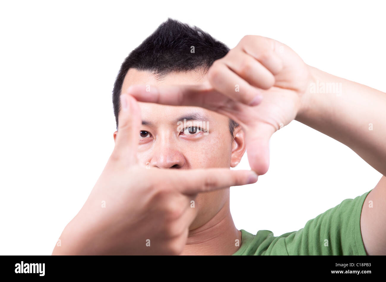 young man showing thinking outside the square Stock Photo - Alamy