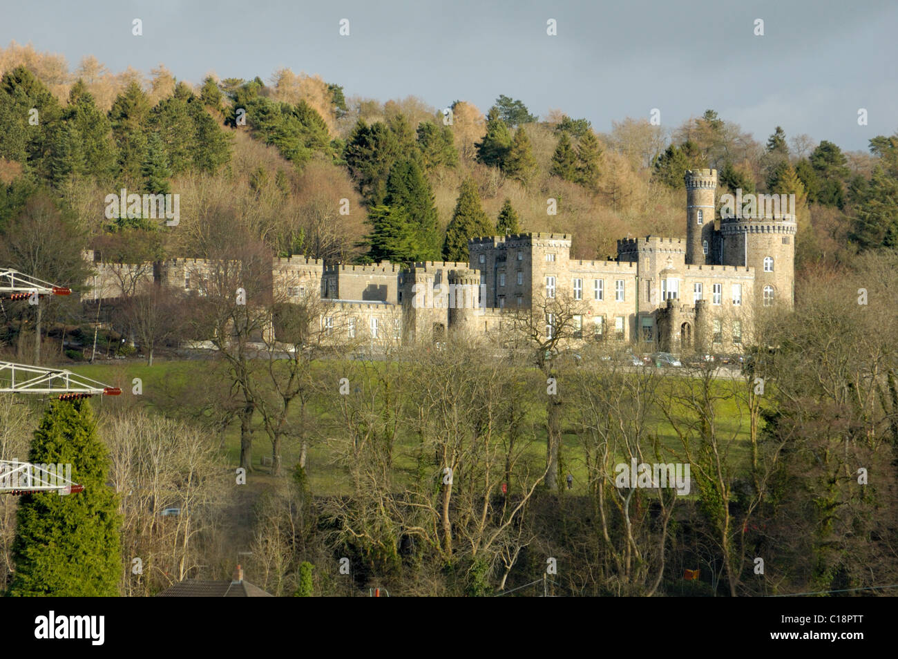 Cyfarthfa Castle Sunlit on the hillside from the opposite side of the ...