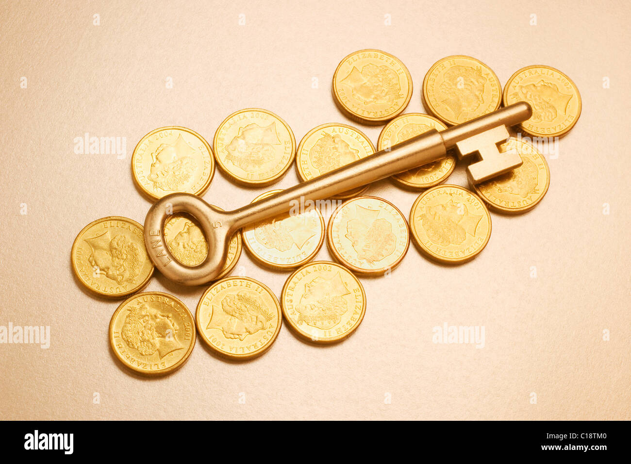Skeleton key on coins Stock Photo - Alamy