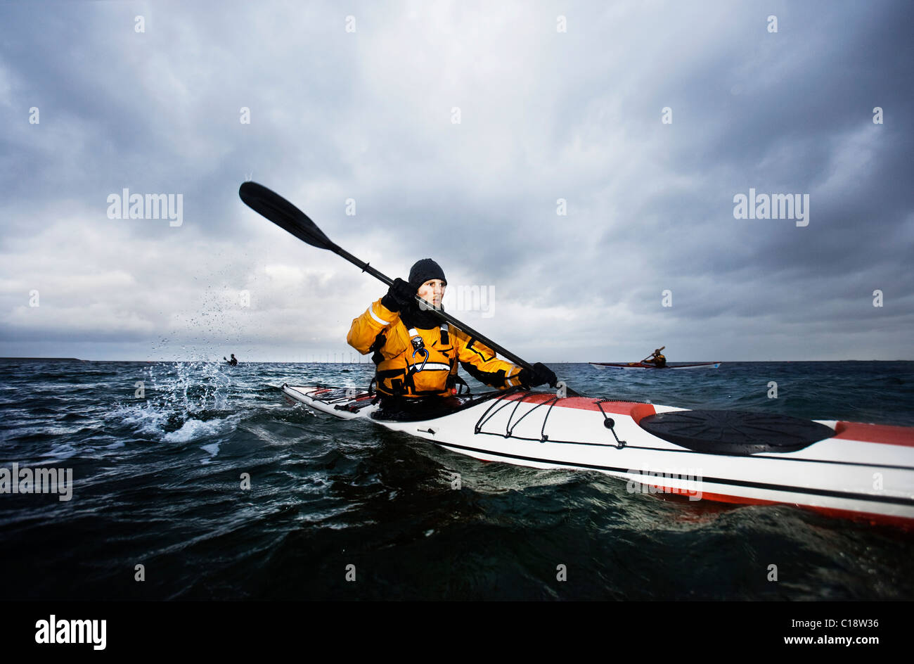 3 kayakers at see Stock Photo - Alamy