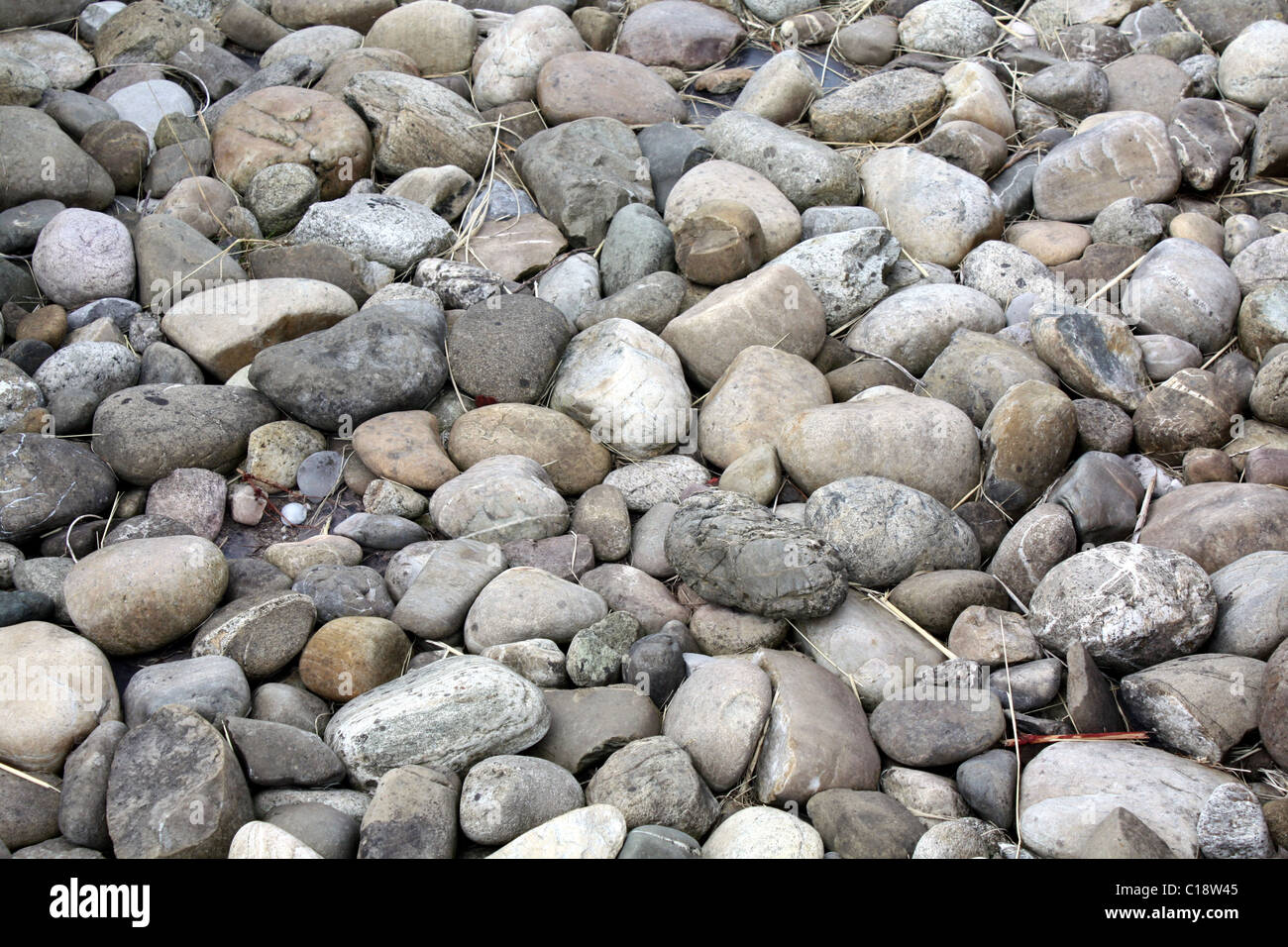 Collection of stone along the road Stock Photo - Alamy