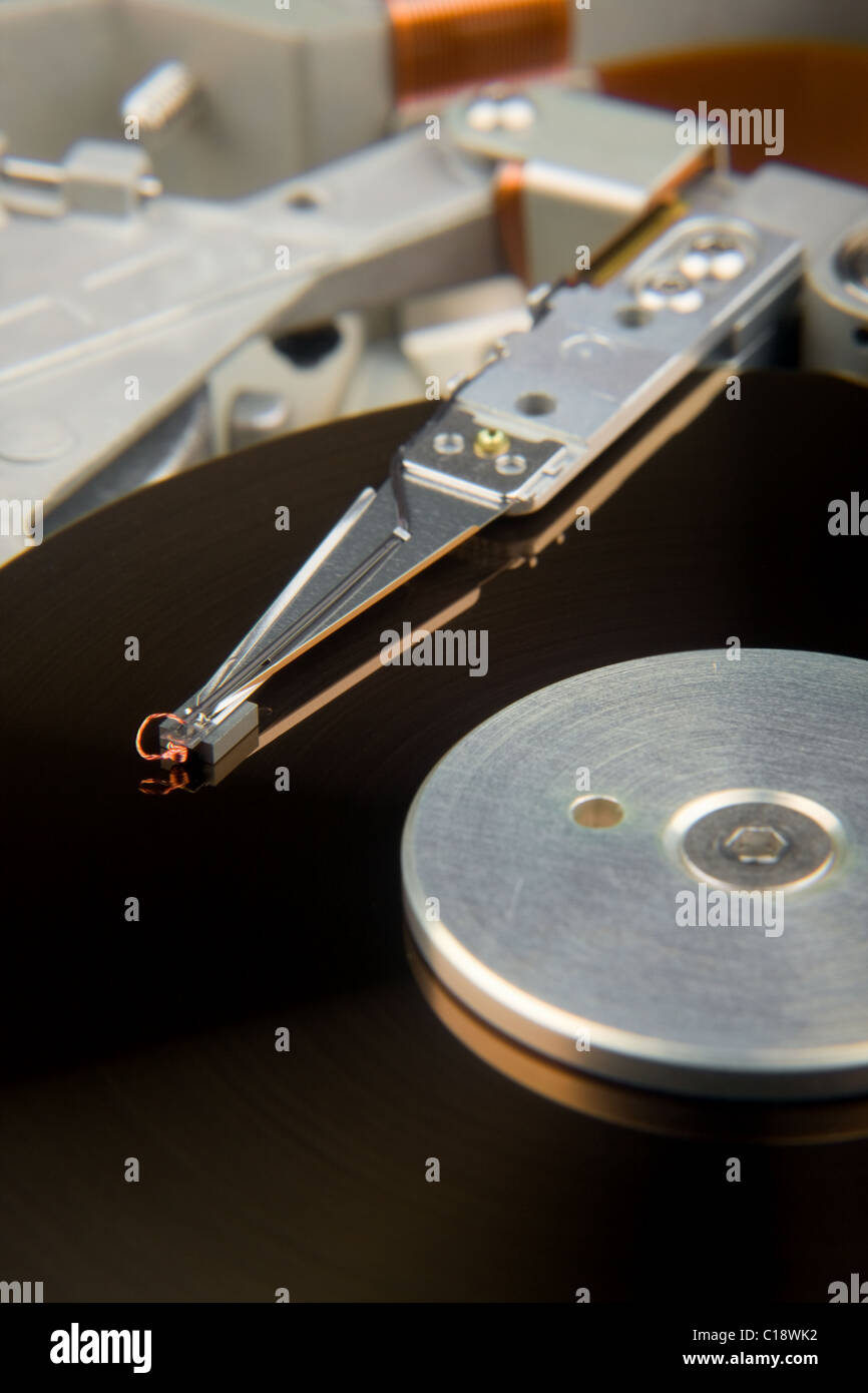 Macro view of the inner workings of a hard disk drive which shows the ...