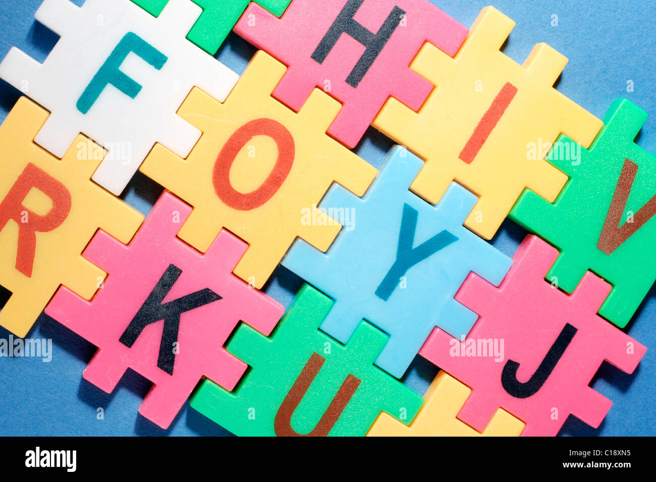 Alphabet jigsaw puzzle hi-res stock photography and images - Alamy