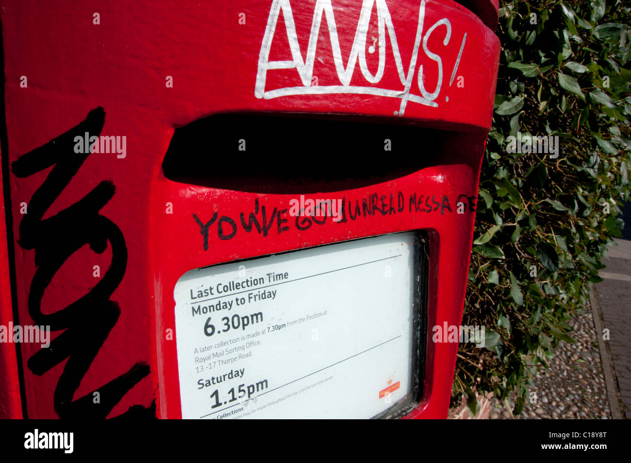 Red post box with graffiti about e mail/text You have 1 unread Message ...
