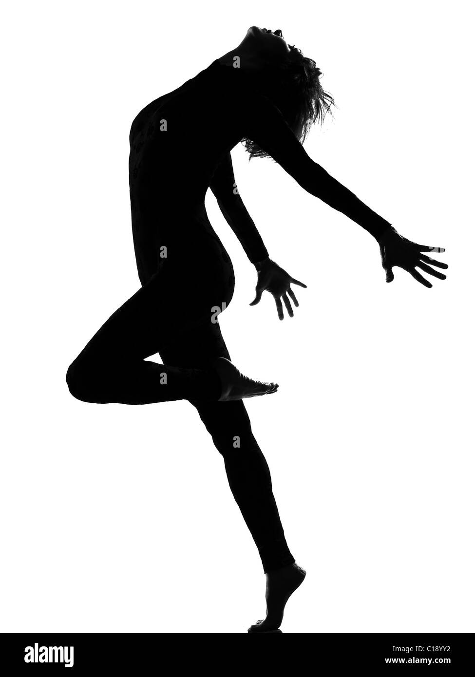 woman in shadow silhouette full length in studio isolated white ...