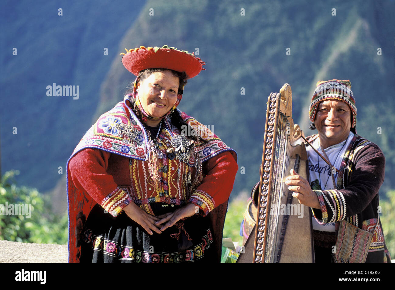 Peru, Cuzco Department, singer wearing a traditional costume near Machu ...