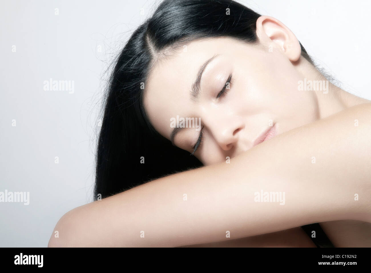 Dark haired young woman, portrait Stock Photo - Alamy