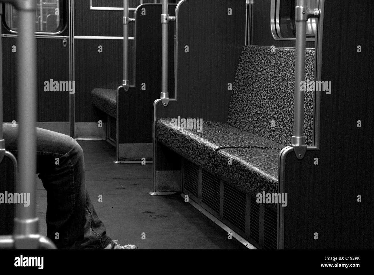 legs in a metro Stock Photo - Alamy