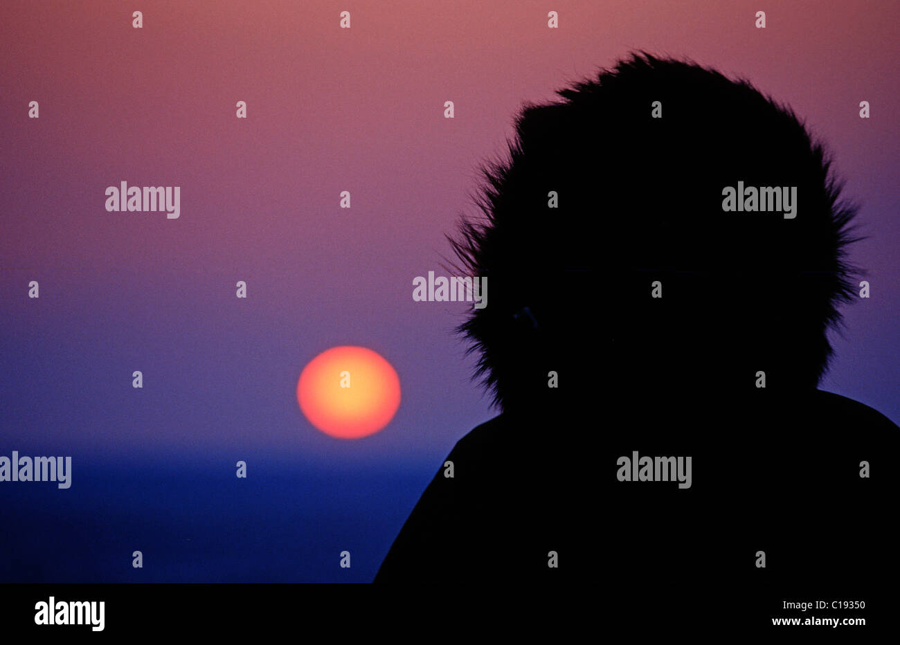 Inuit at sunset, Nuiqsut, on the coast of the Arctic Ocean in the far ...