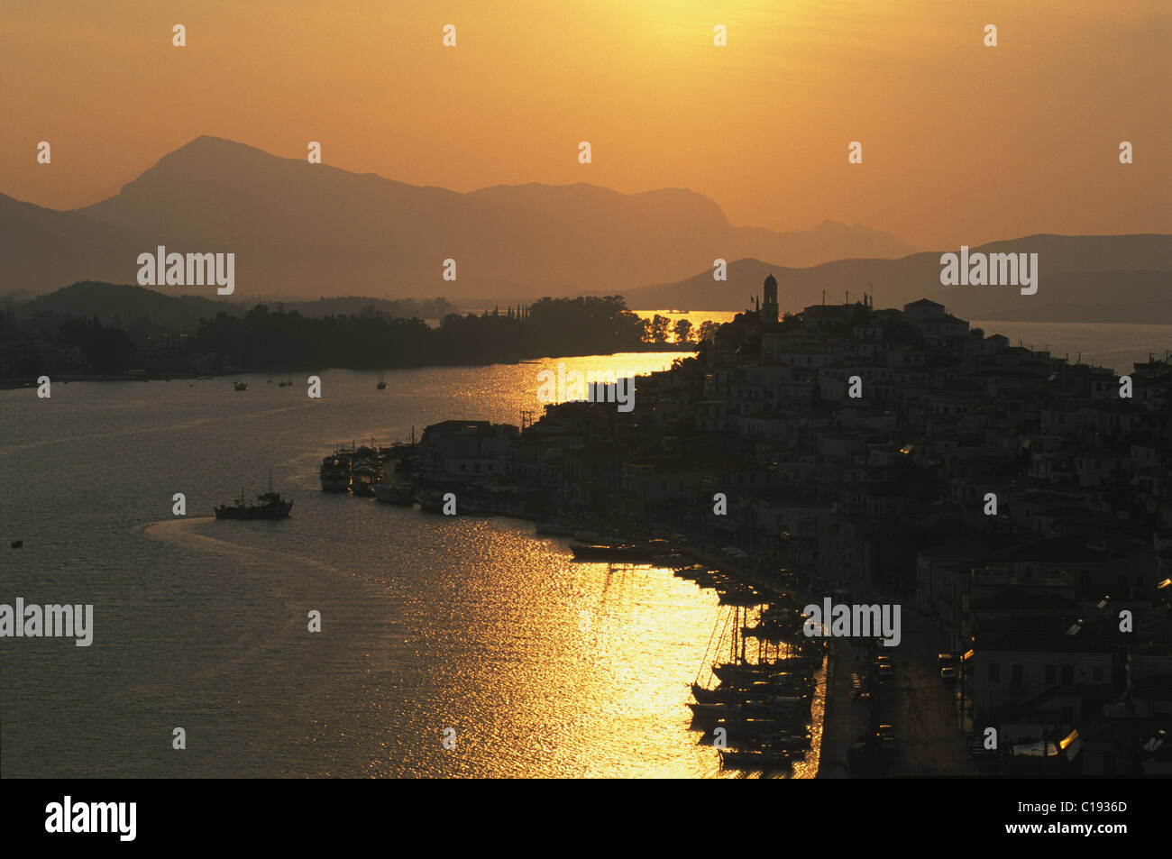Greece, Saronic Islands, Poros Island, Poros-city at sunset Stock Photo ...