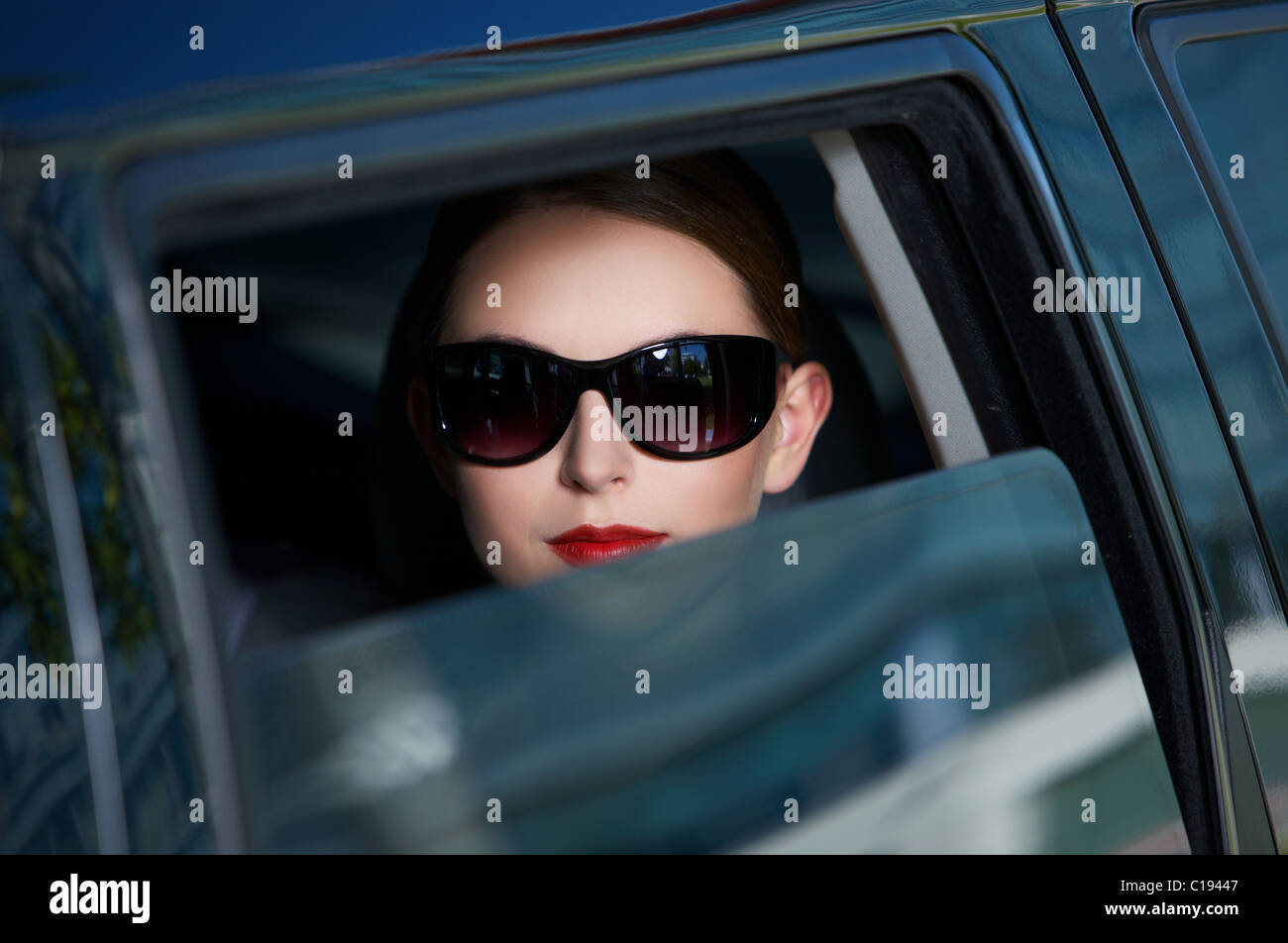 Portrait of beautiful business woman inside the limo car Stock Photo ...