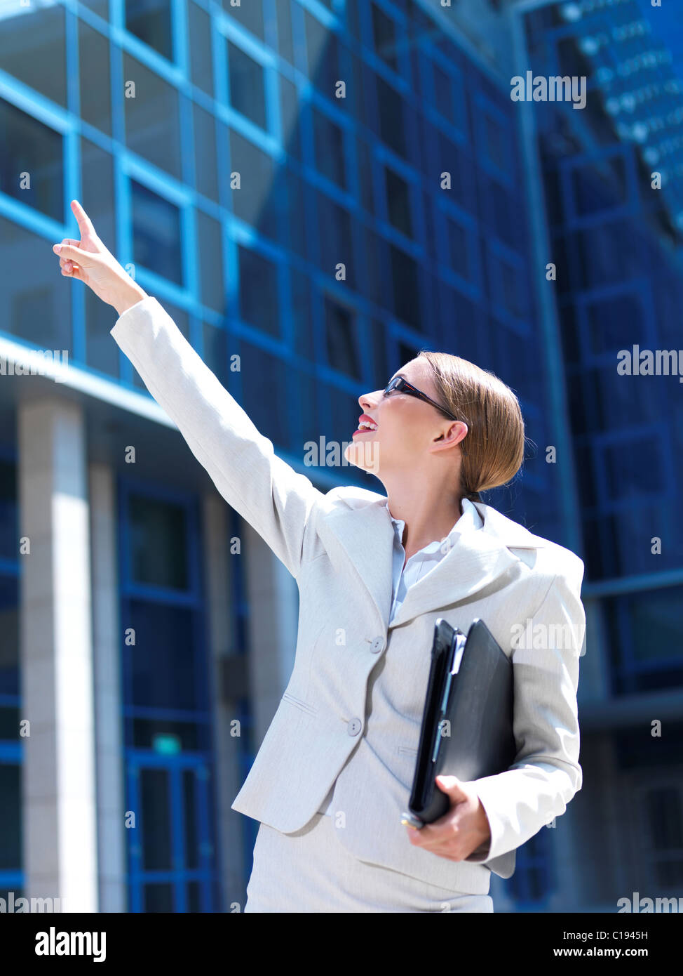 Beautiful business woman standing outdoor modern building Stock Photo ...