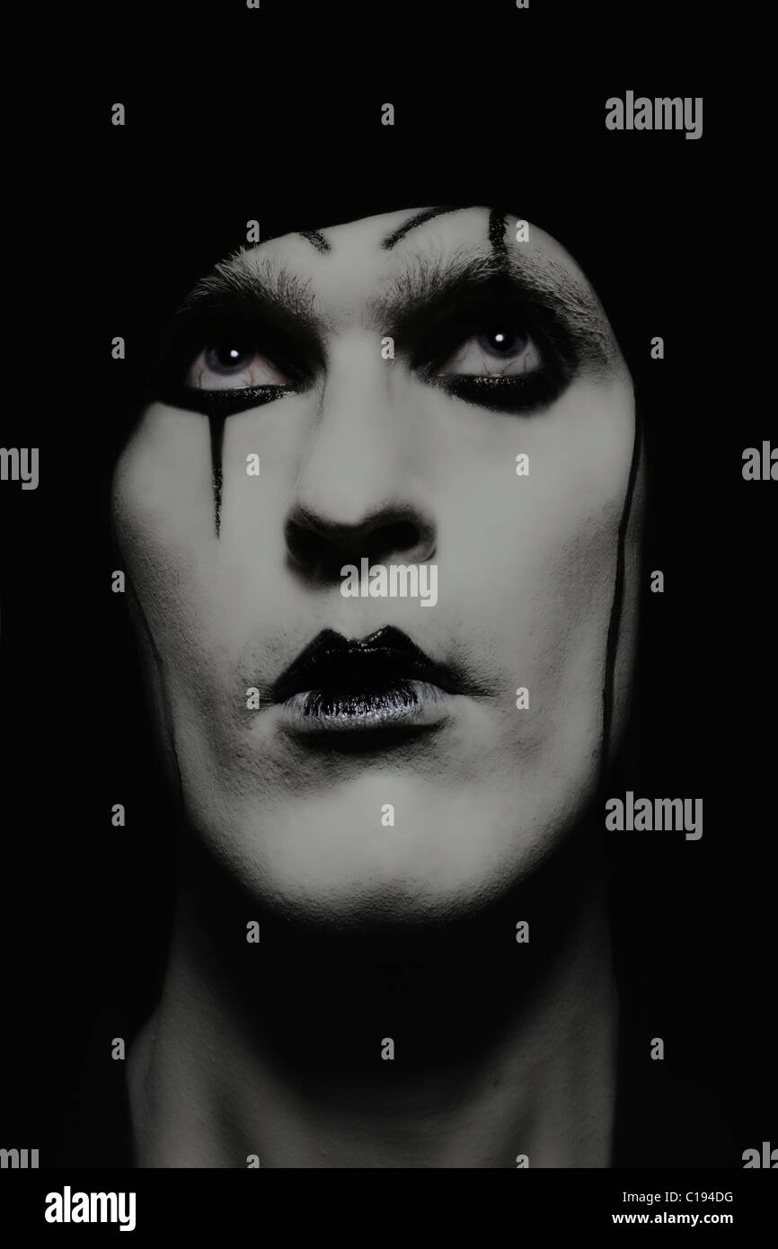 theatrical actor with dark makeup on her face Stock Photo - Alamy