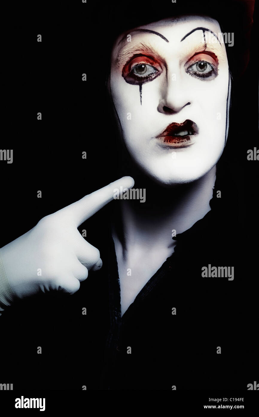 grimace theatrical actor with dark makeup on her face Stock Photo - Alamy