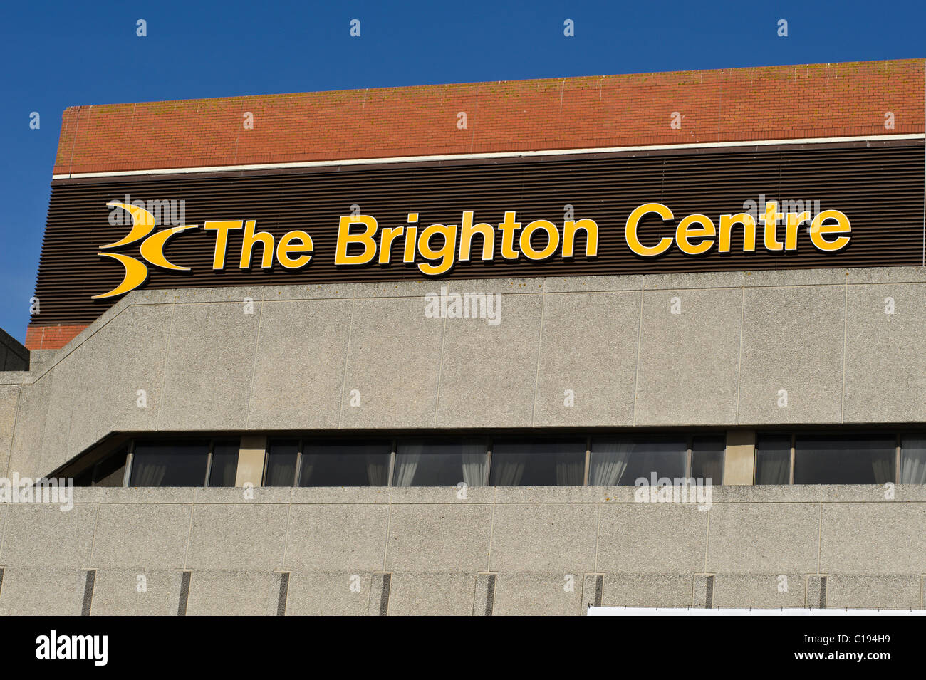 The yellow sign on the front of The Brighton Centre. Brighton. March ...