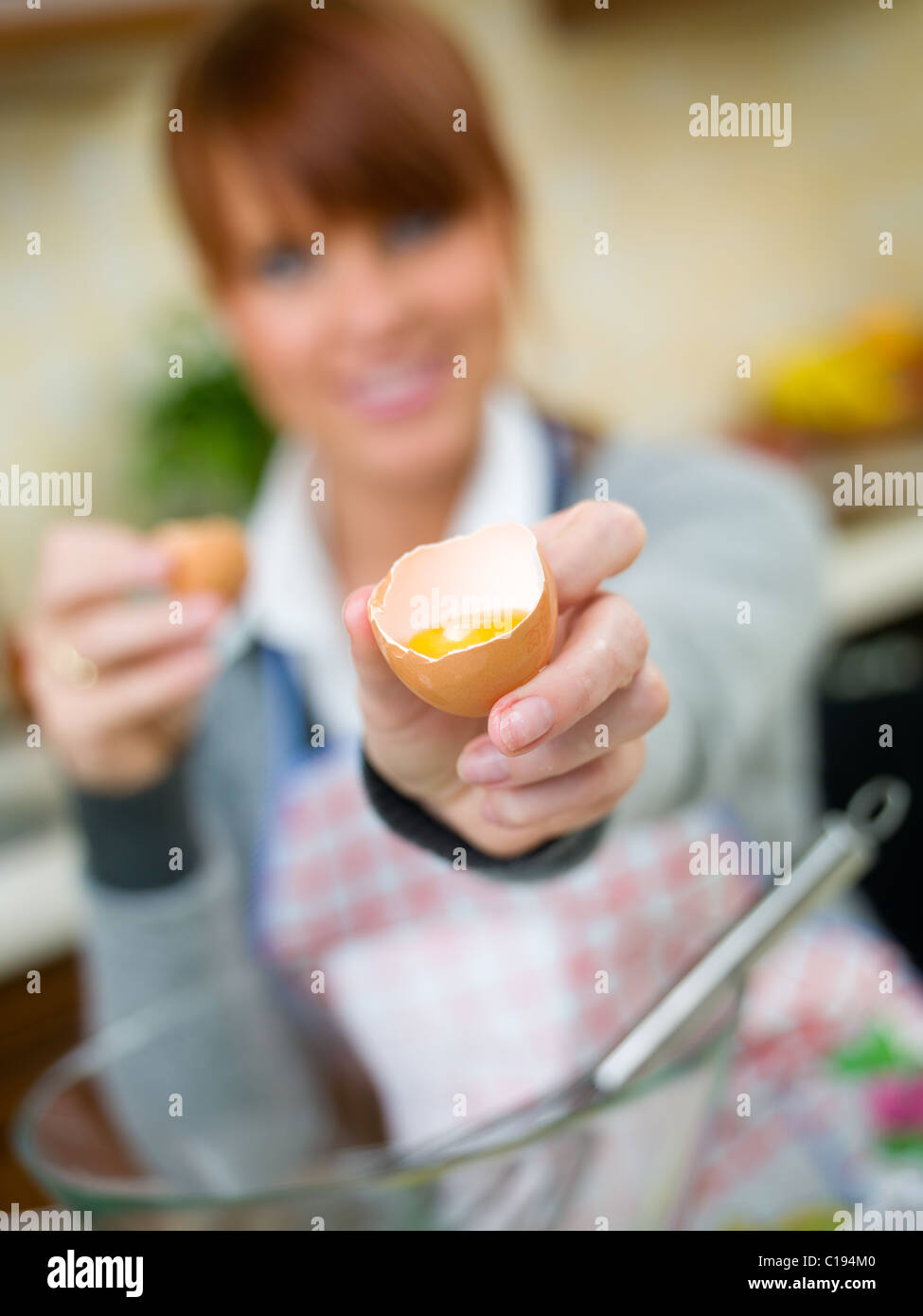 Woman alone making a cake hi-res stock photography and images - Alamy