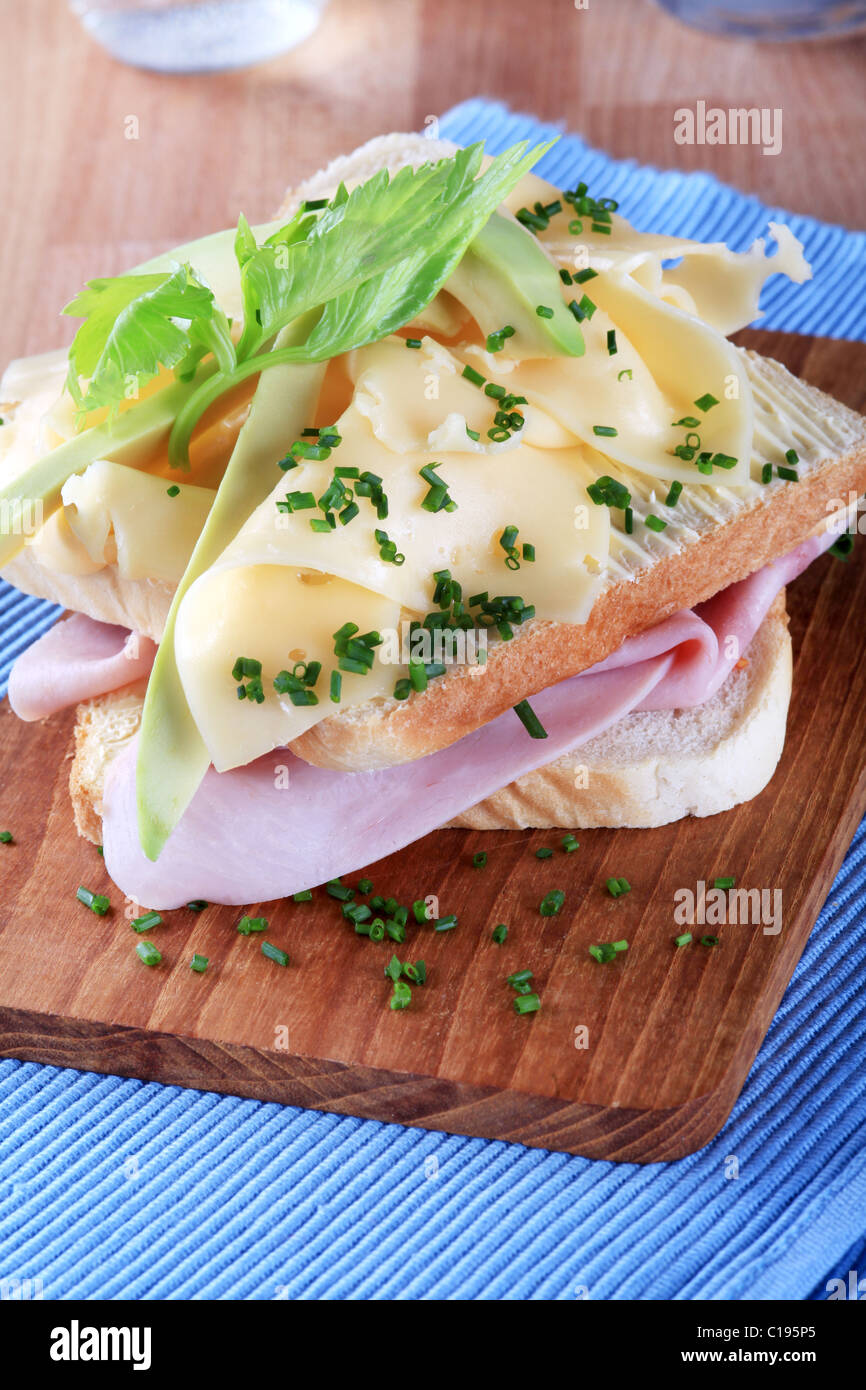 Ham and cheese sandwich with avocado and chives Stock Photo - Alamy