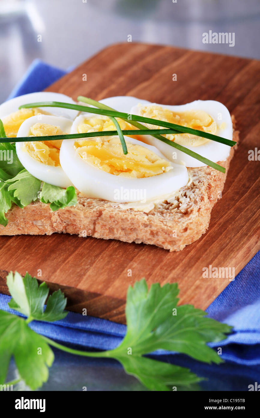 Whole grain bread with slices of boiled egg Stock Photo - Alamy