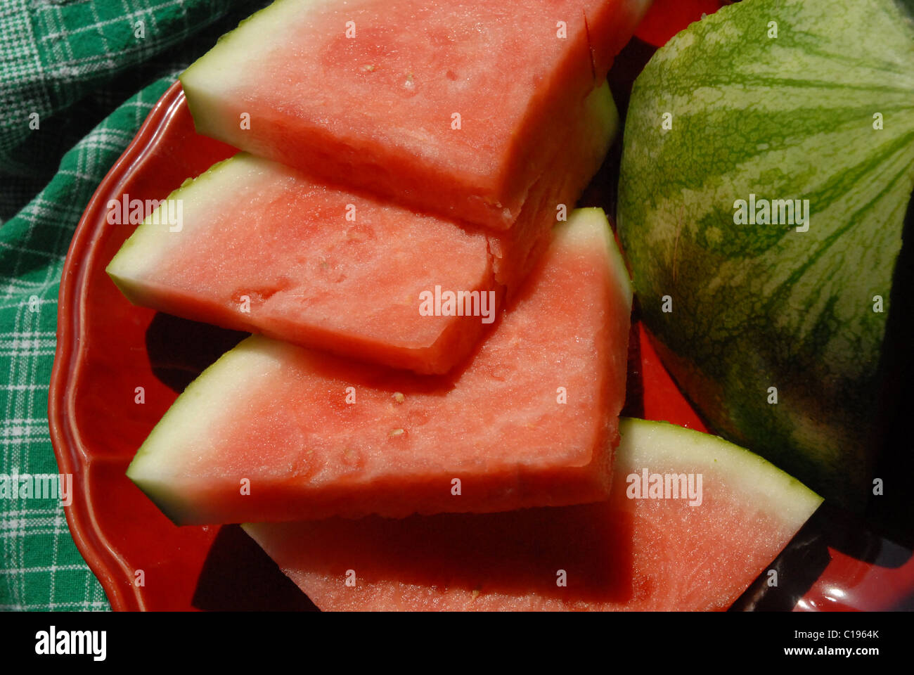 Sliced seedless watermelon on plate Stock Photo - Alamy