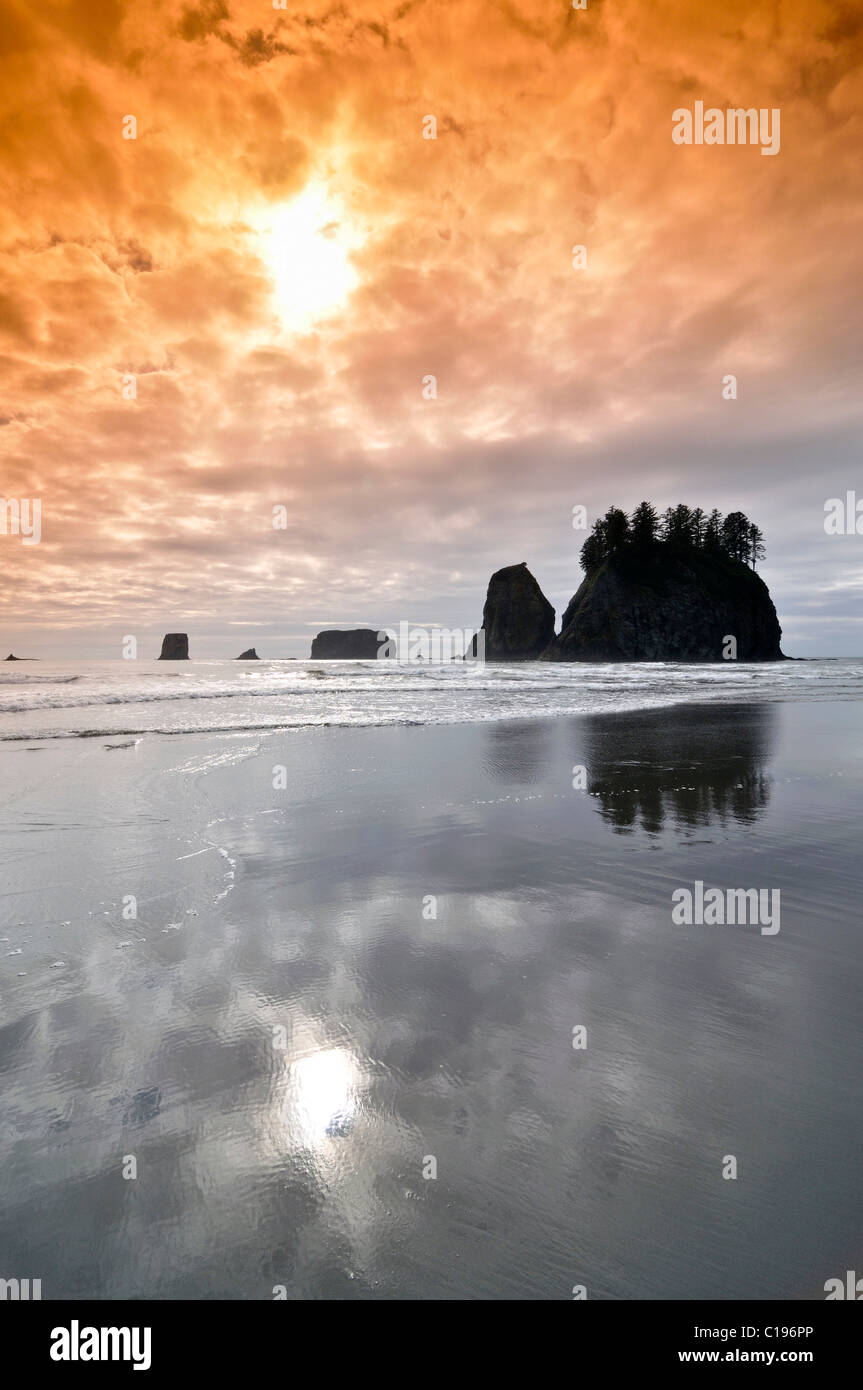 Sun reflected in the sea at Rialto Beach, Mora, Olympic National Park ...