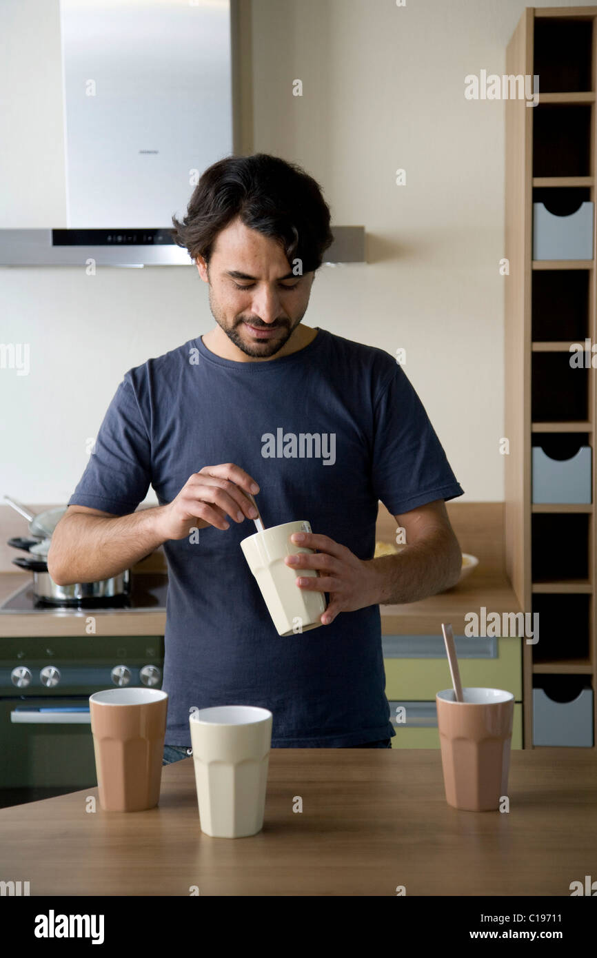 Man making coffee Stock Photo - Alamy
